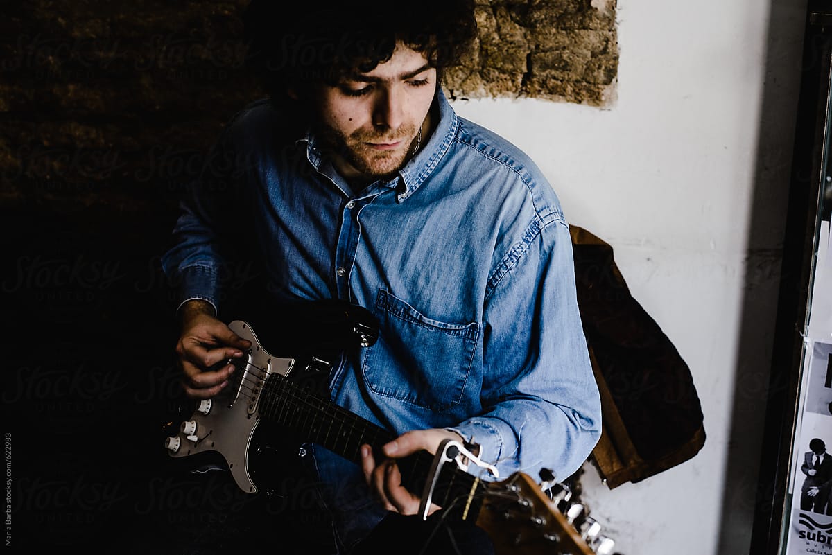 "Male Musician Playing Blues Music With His Electric Guitar" by Stocksy ...