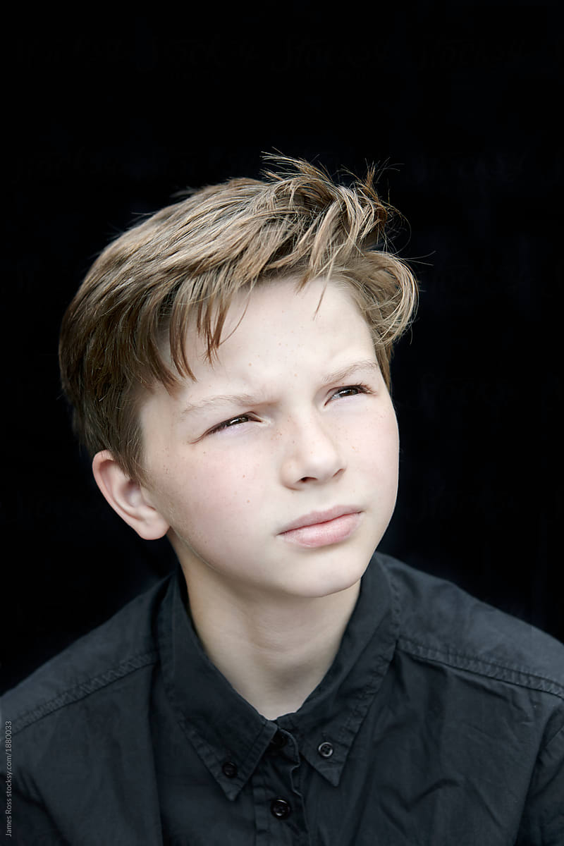 "Portrait Of A Male Teenager" by Stocksy Contributor "James Ross" - Stocksy