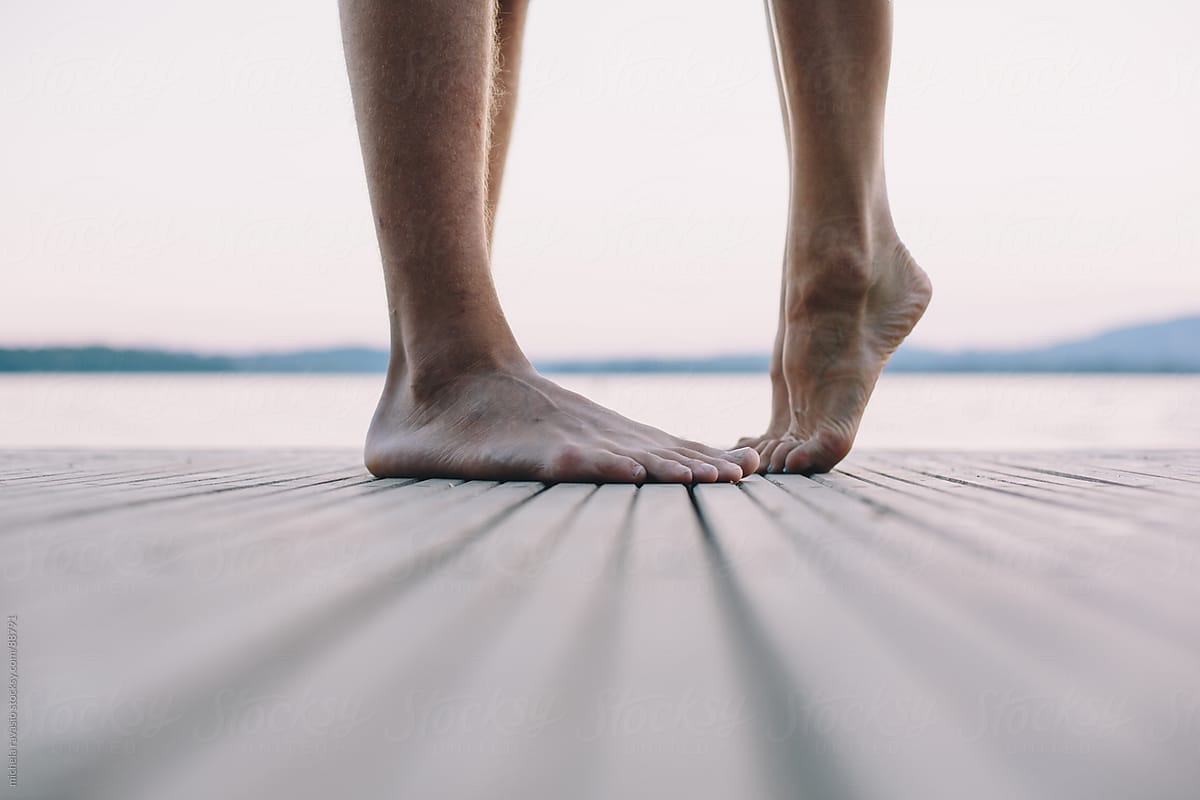 "Two Pairs Of Feet" by Stocksy Contributor "Michela Ravasio" - Stocksy