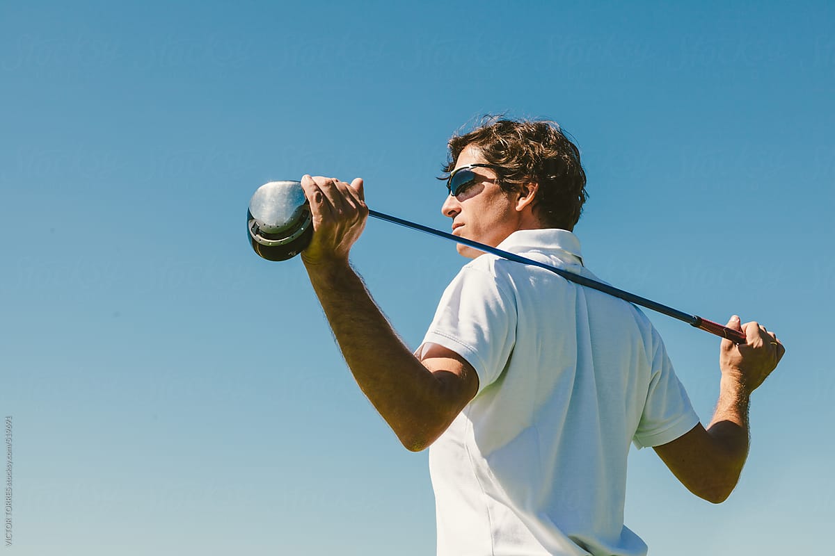 "Golfer Having A Rest" by Stocksy Contributor "VICTOR TORRES" - Stocksy