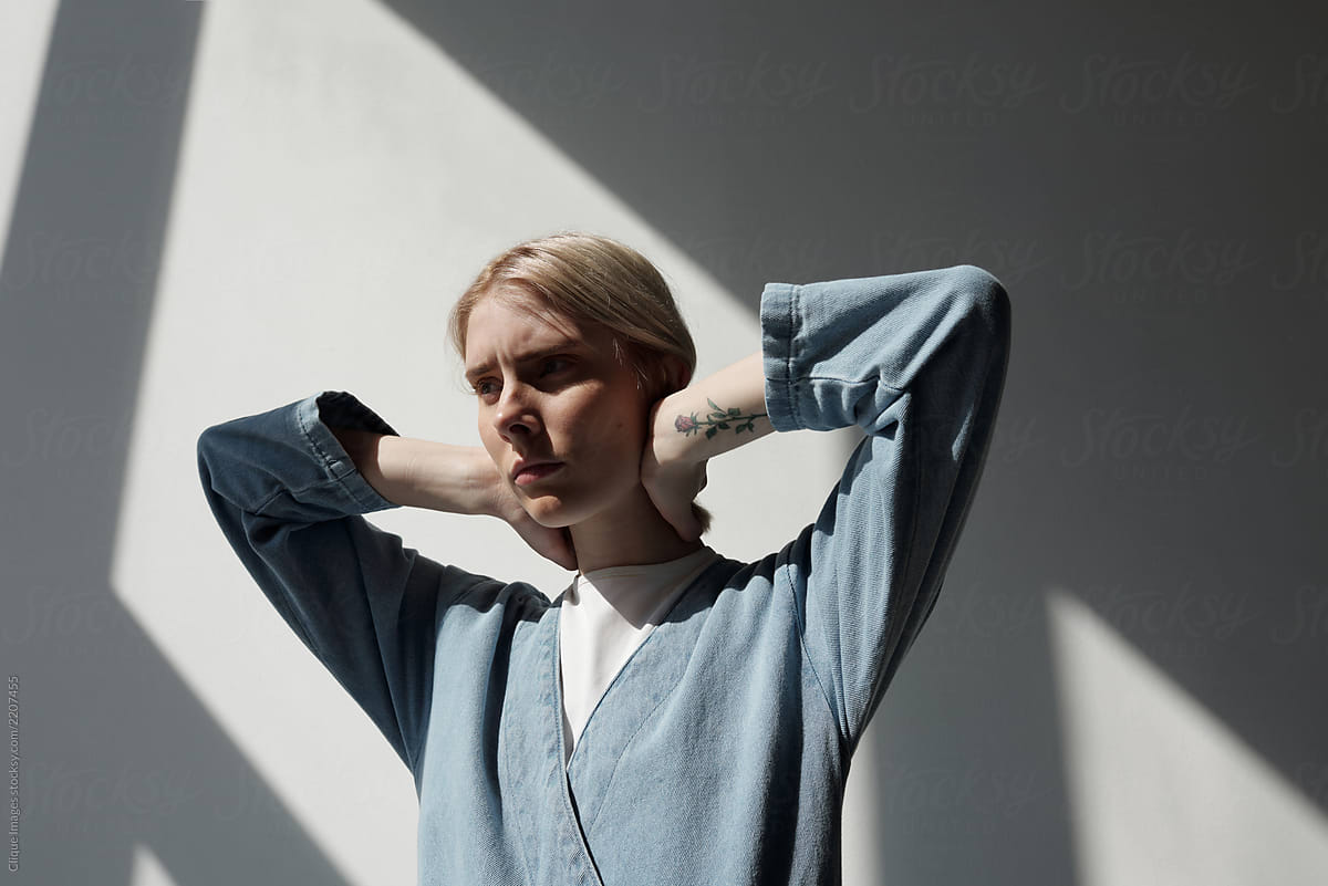 "Young Depressed Woman" by Stocksy Contributor "Clique Images" - Stocksy