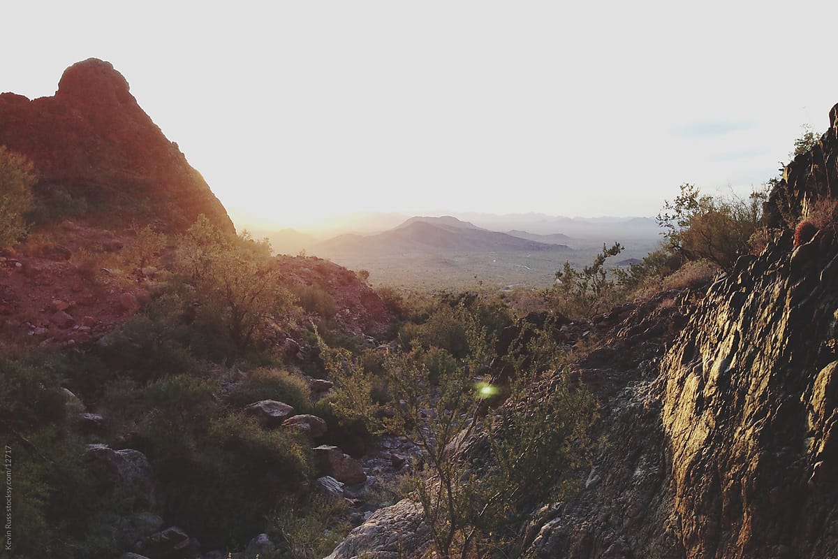 "Desert Canyon Opening" by Stocksy Contributor "Kevin Russ" - Stocksy