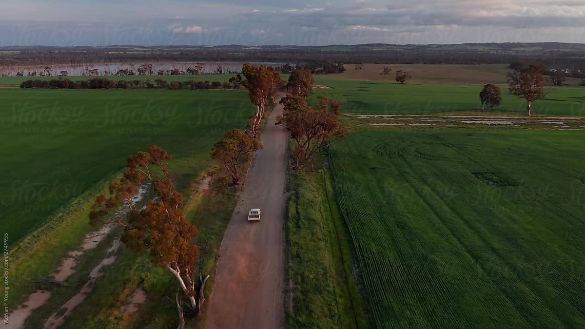 "Ute Driving Down Country Road Aerial" by Stocksy Contributor "Adrian P ...