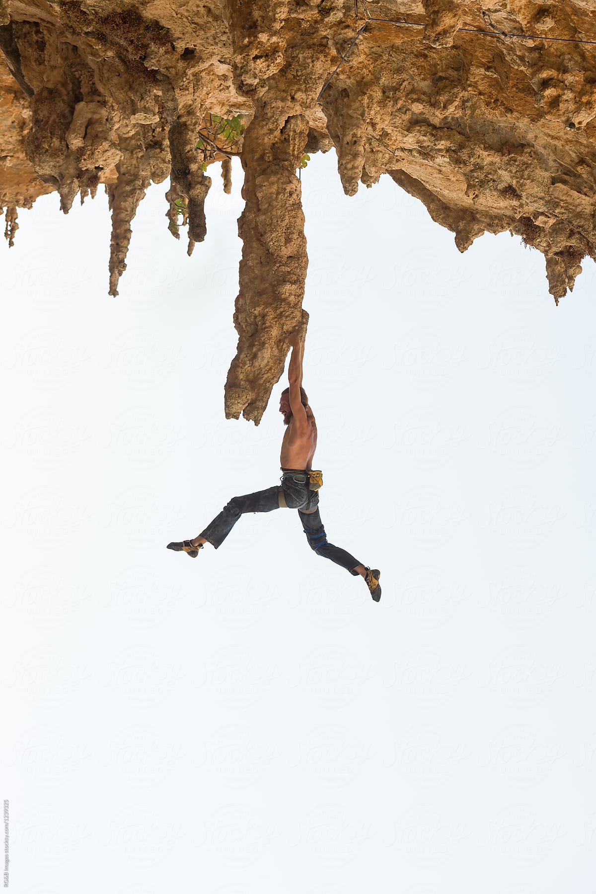 "Male Climber Hanging On A Stalactite High Up" by Stocksy Contributor ...