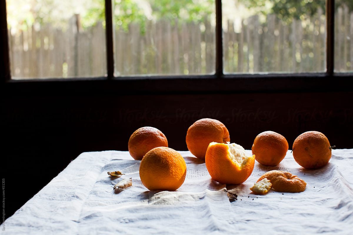 "Oranges On Table In Cabin" by Stocksy Contributor "Sara Remington ...