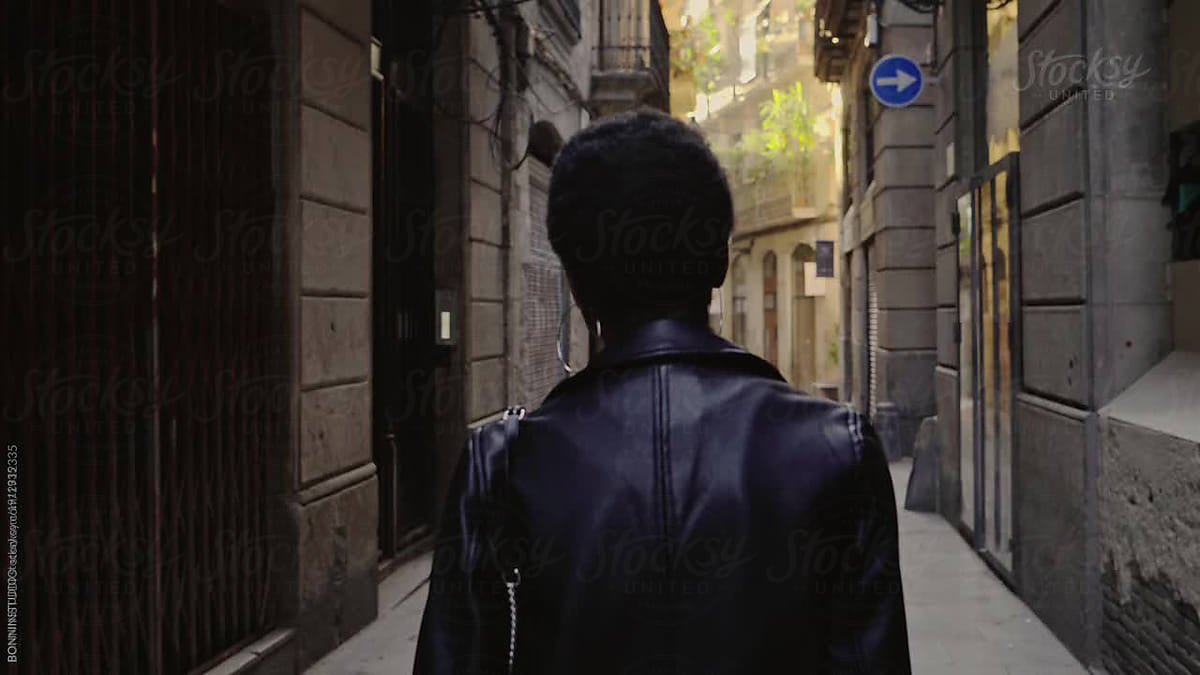 "Back View Of A Cool Woman Walking On The Street." by Stocksy ...