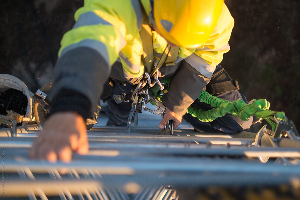 "Working At Heights, Technician Climbs Up On A Communications Tower" by ...