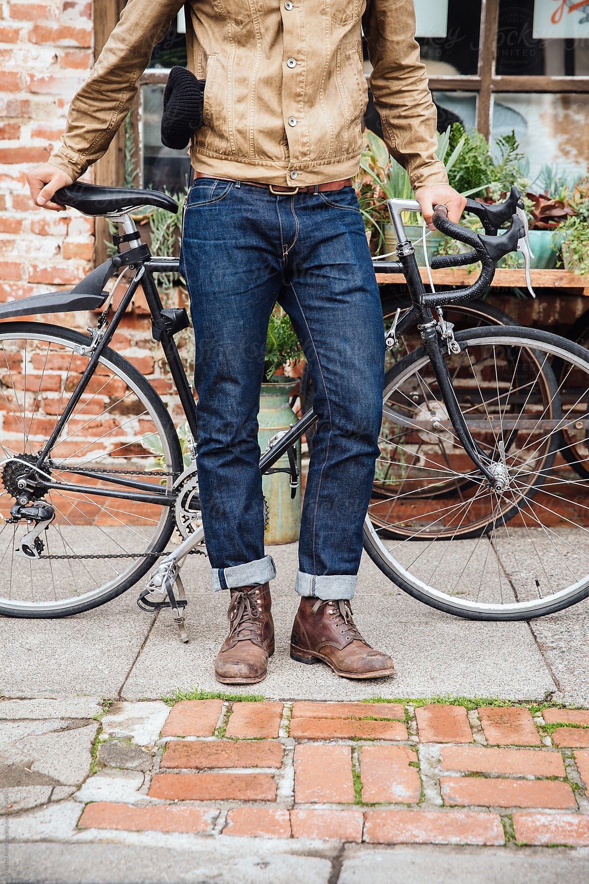"Man With Bike In Urban Area" by Stocksy Contributor "Trinette Reed ...
