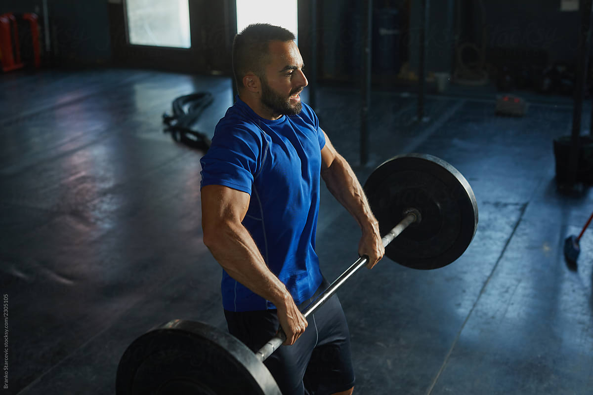 Strong Person Lifting Weights
