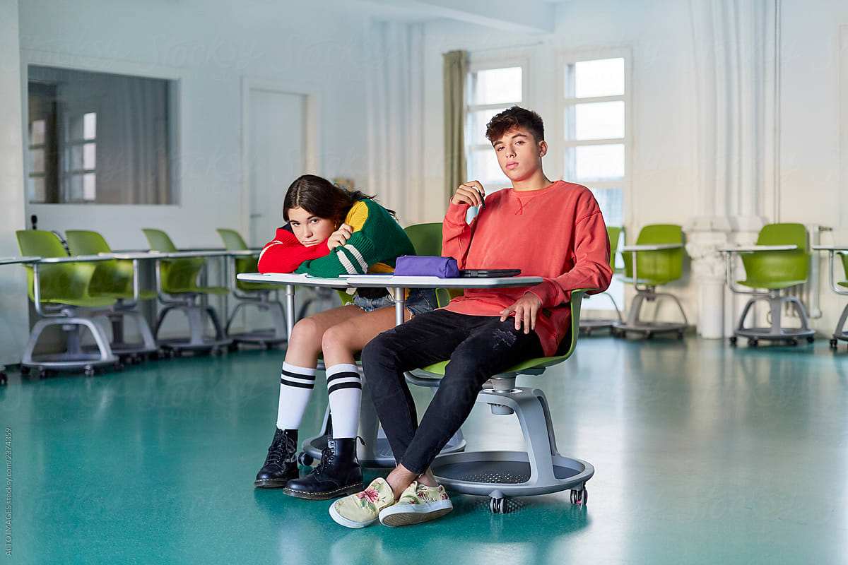 "Teenage Classmates Sitting In The Classroom" by Stocksy Contributor ...