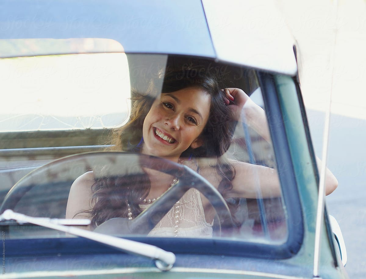 "A Young Woman Peering Through Front Windshield Of Old Pickup." by ...
