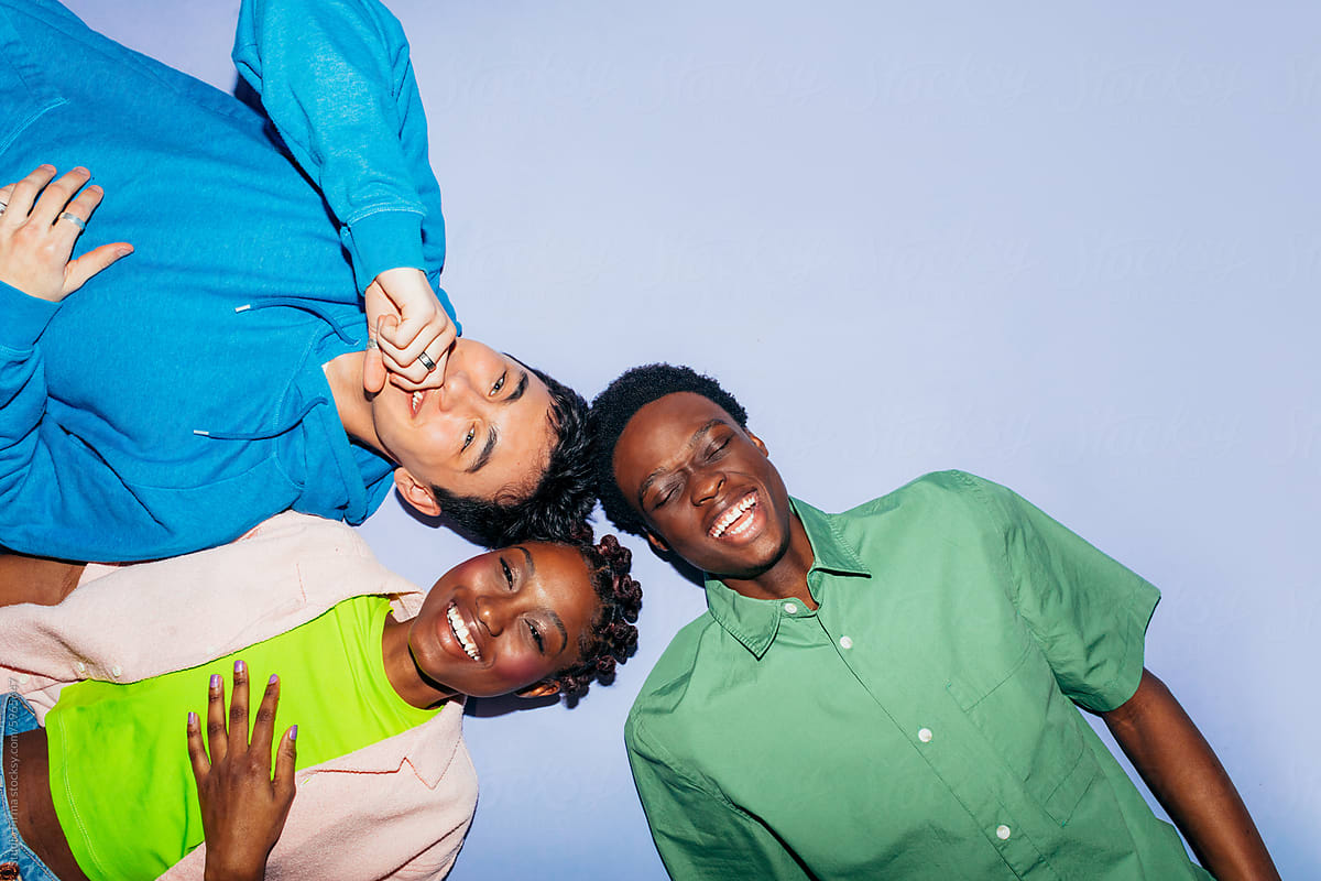 "Friends Chilling Out" by Stocksy Contributor "Studio Firma" - Stocksy