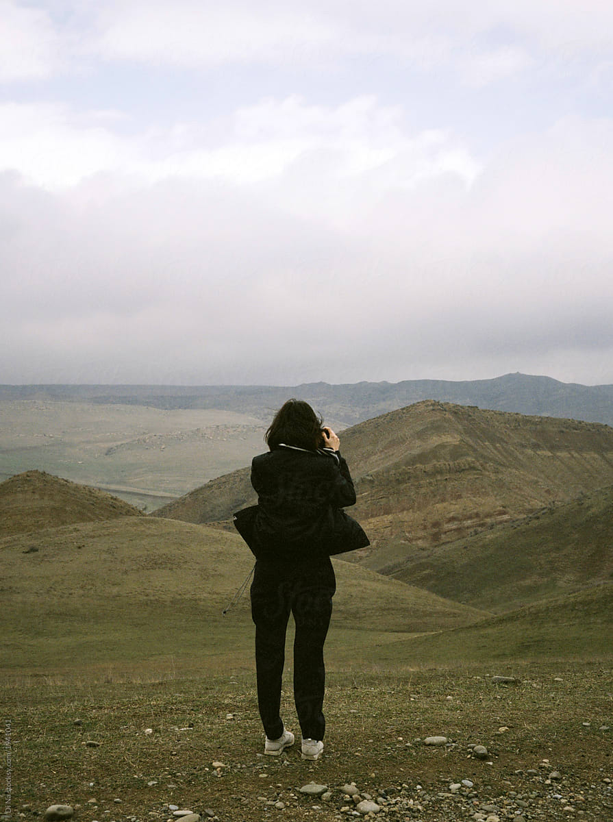 "Young Woman From The Back Photographing Beautiful Landscape" by ...