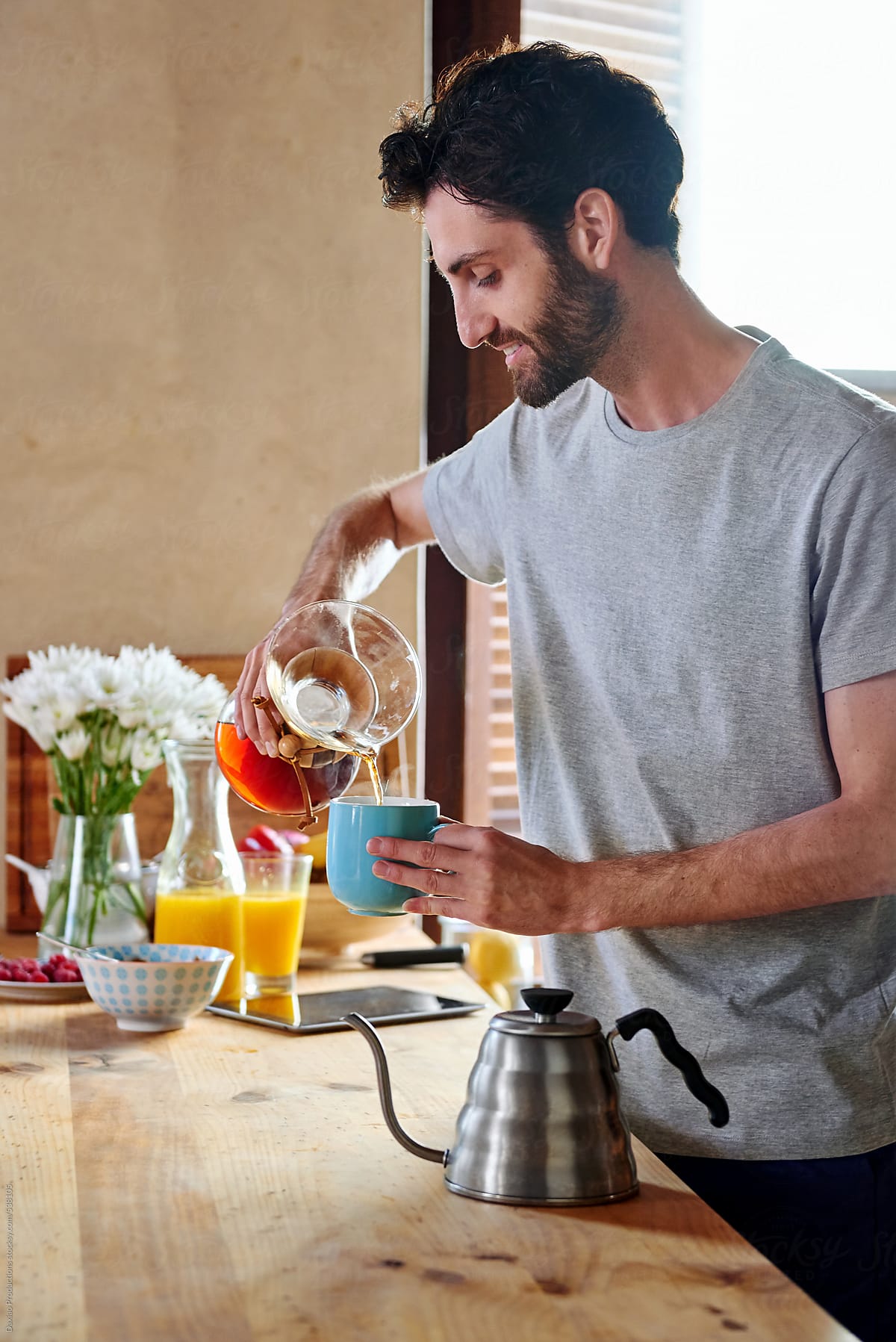 "Man Preparing Morning Coffee" by Stocksy Contributor "Daxiao ...