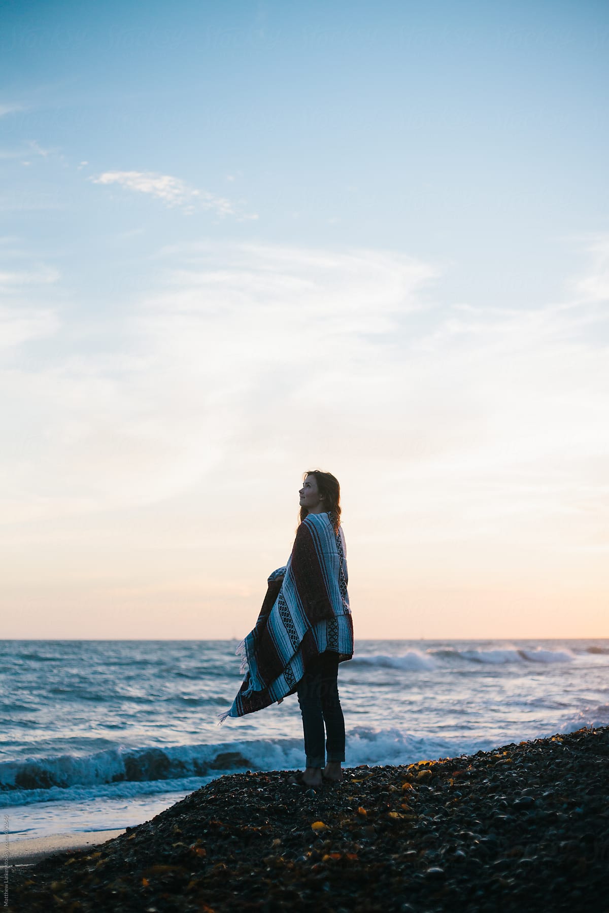 "Beach Walk At Sunset" by Stocksy Contributor "Matthew Linker" - Stocksy