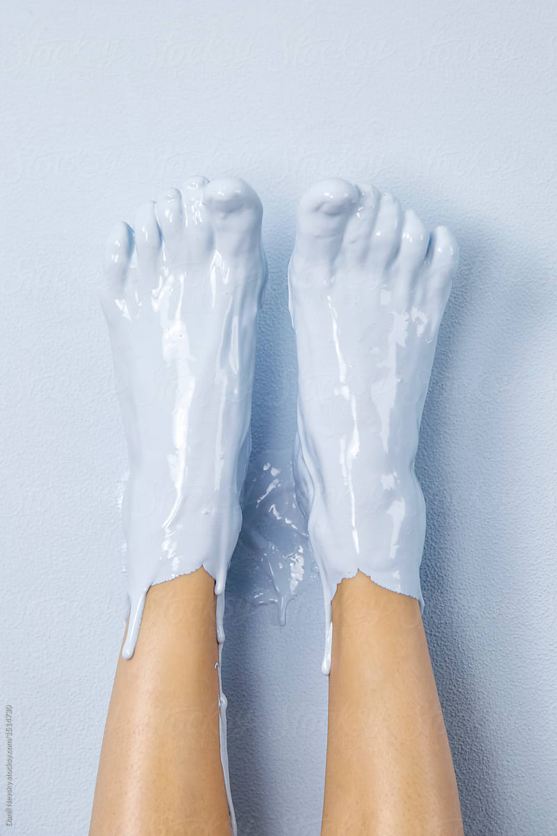"Crop Feet In Liquid Paint" by Stocksy Contributor "Danil Nevsky" - Stocksy