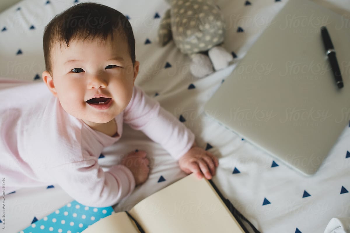  Working From Home With Baby By Stocksy Contributor Lauren Lee Stocksy