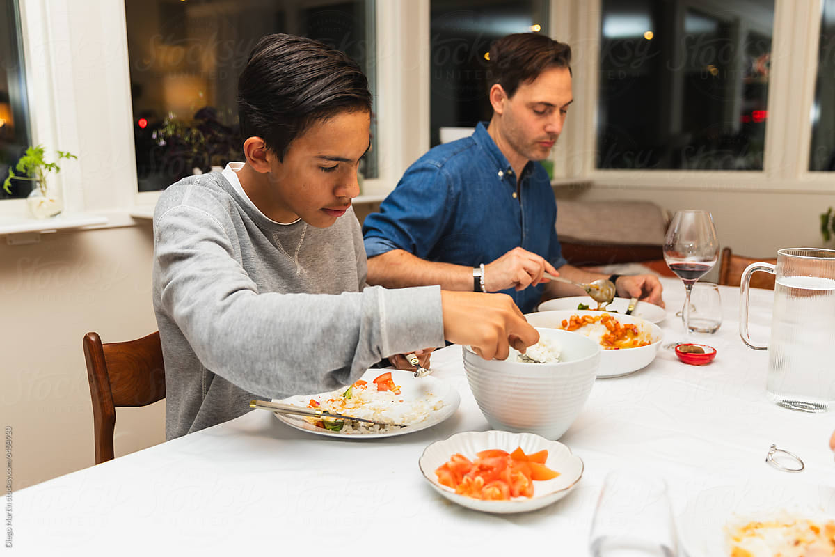 "Multiracial Family Enjoying Homemade Dinner Together" by Stocksy ...