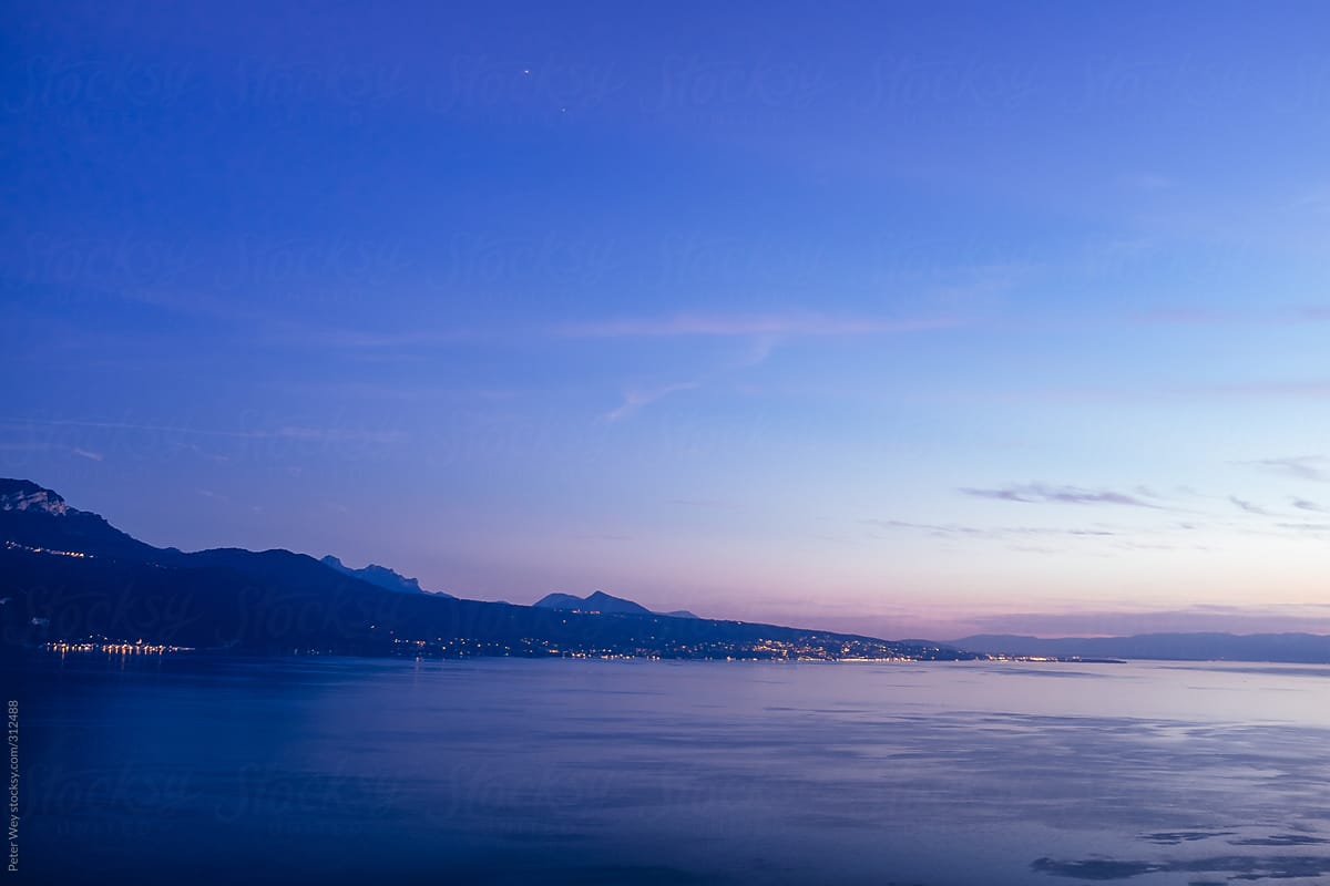 "Lake Geneva At Sunset" by Stocksy Contributor "Peter Wey" - Stocksy