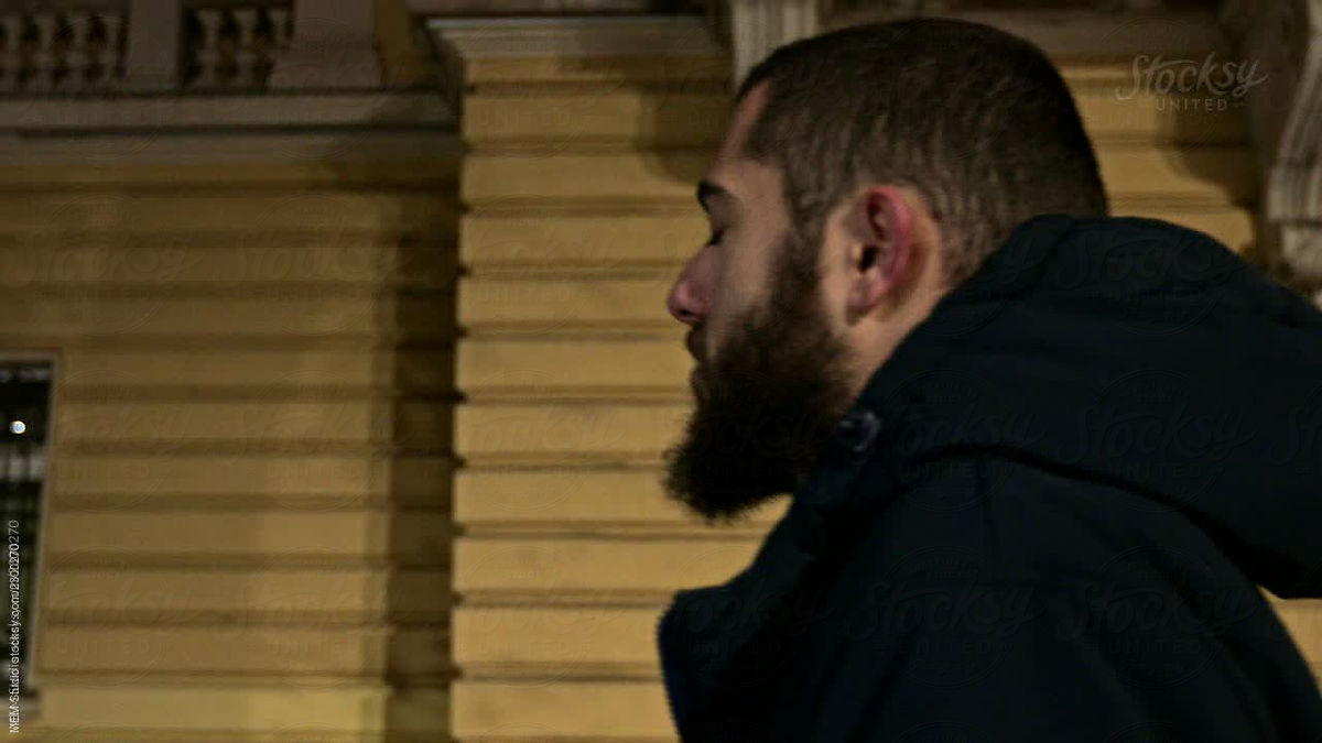 "Portrait Of A Bearded Young Man Walking In The Night" by Stocksy ...