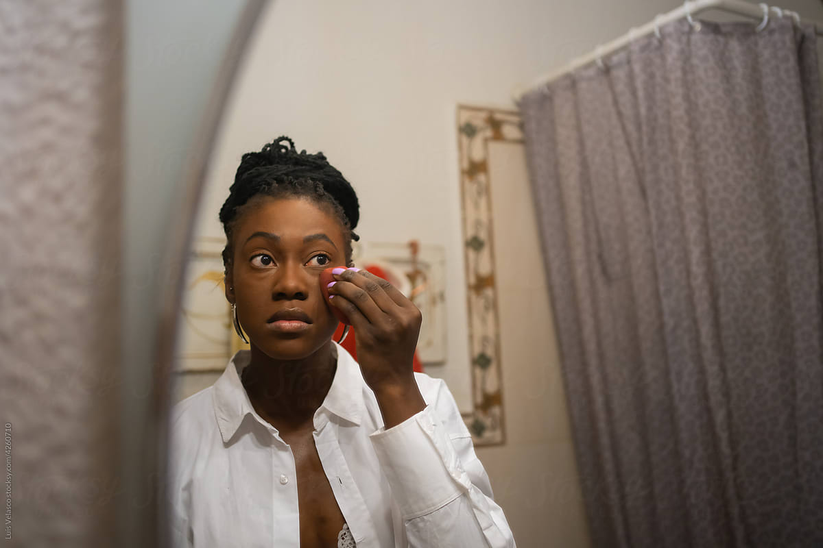 "Black Woman Making-Up At Home." by Stocksy Contributor "Luis Velasco ...