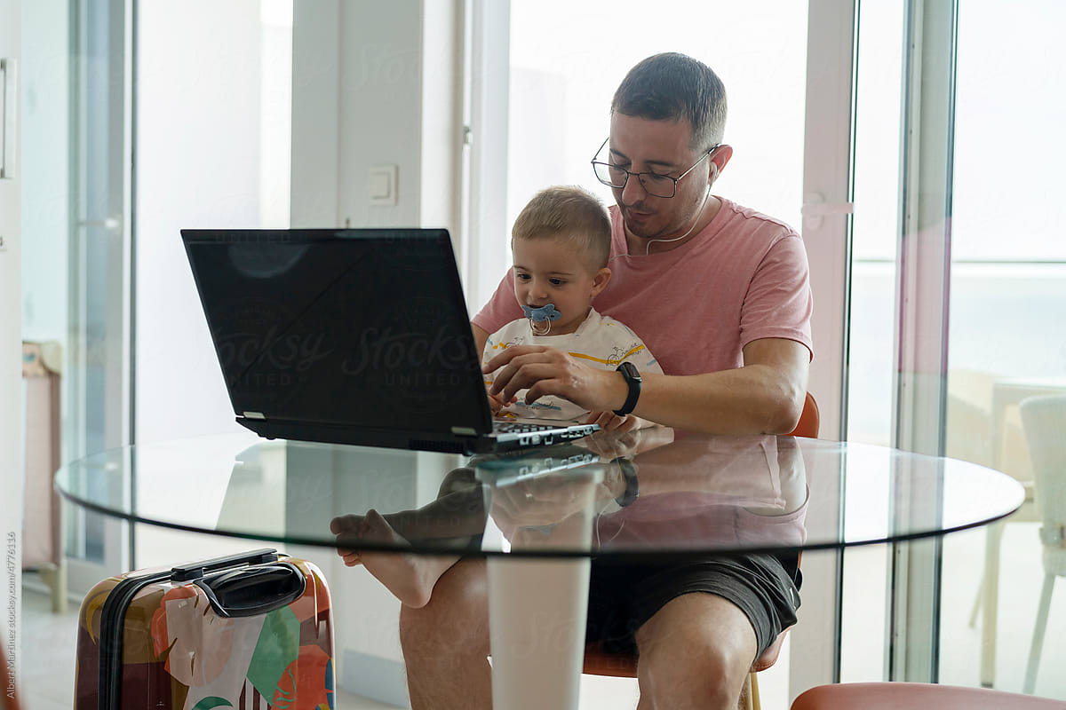 "Father Working From The Hotel With His Son" by Stocksy Contributor ...