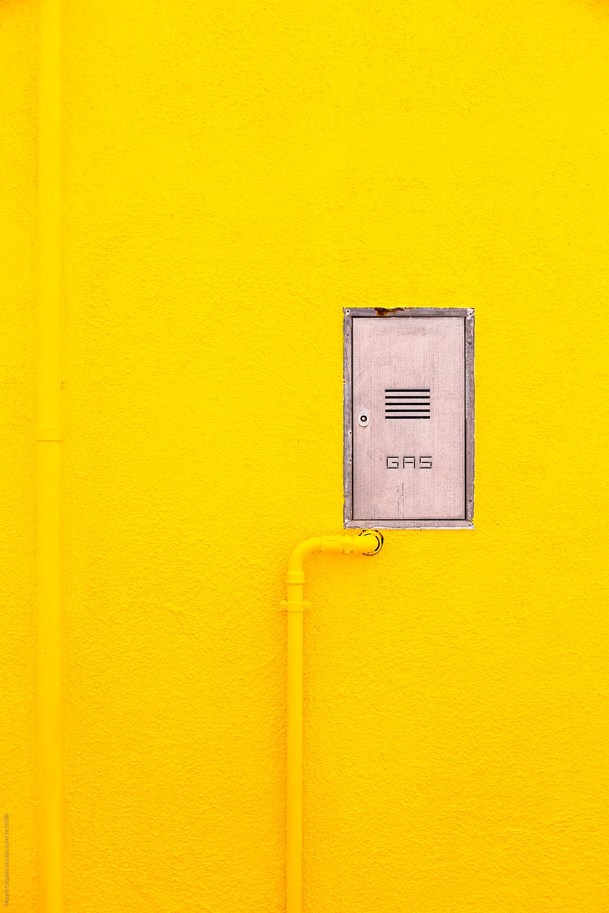 Gas Sign Of The Gas Meter On The Yellow Wall By Stocksy Contributor Gas Sign Of The Gas Meter On The Yellow Wall By Stocksy Contributor