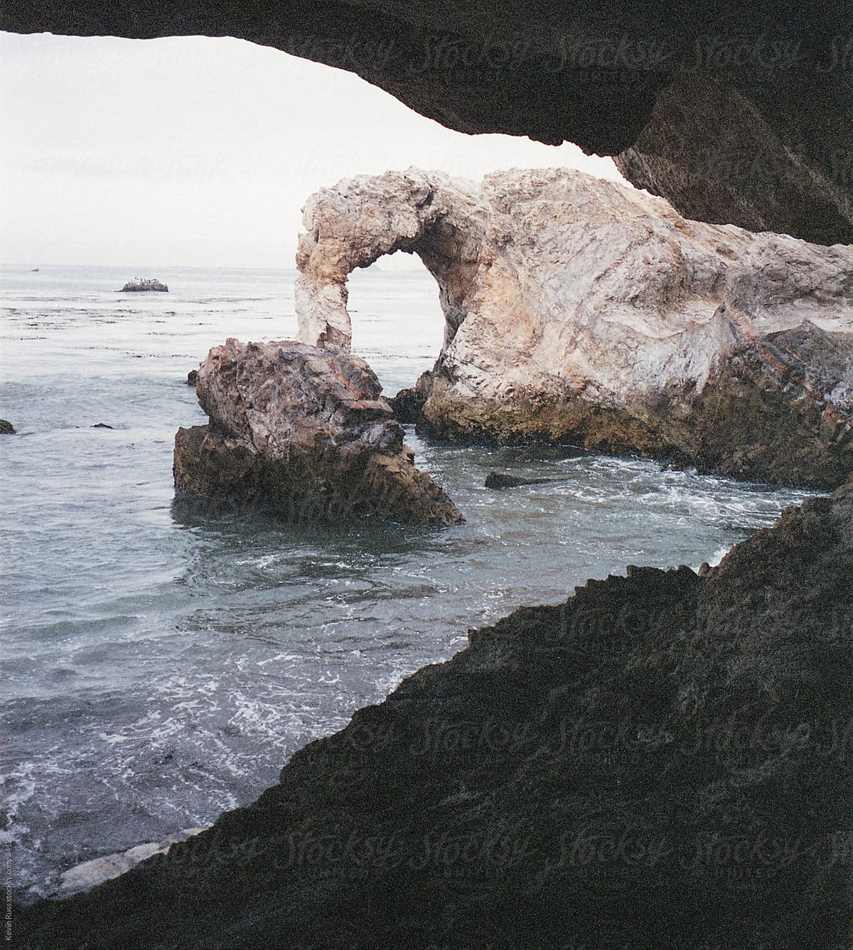 "Cave View Of An Arch" by Stocksy Contributor "Kevin Russ" - Stocksy