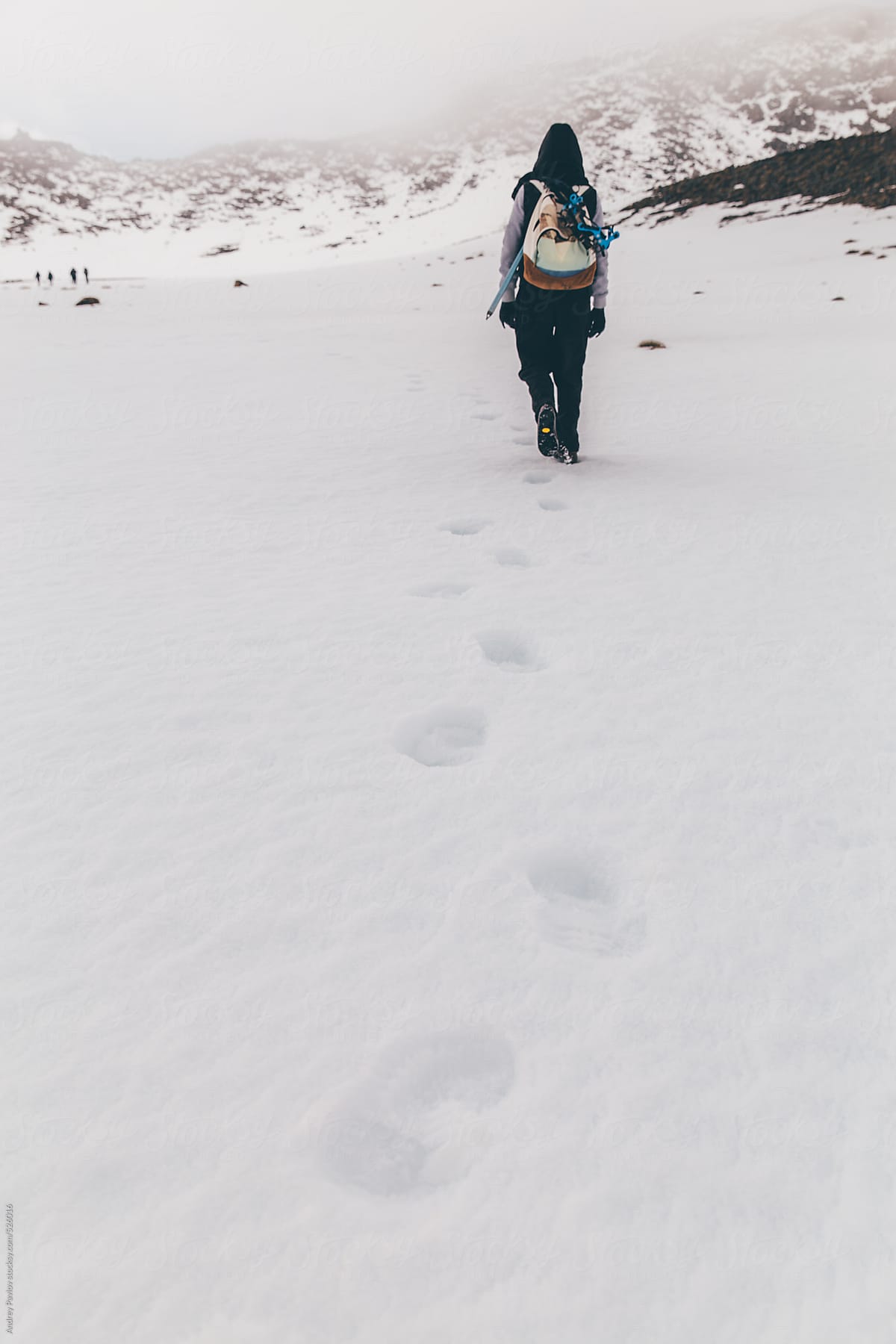 "Steps On The Snow" by Stocksy Contributor "Andrey Pavlov" - Stocksy