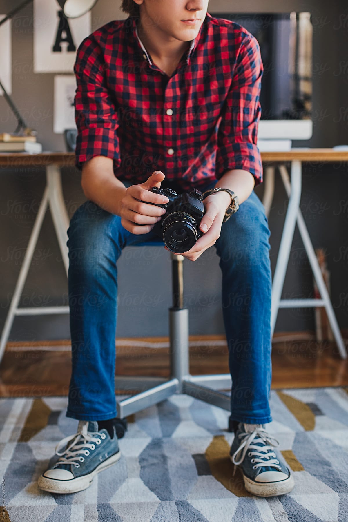 "Teenage Boy With His Camera" by Stocksy Contributor "Lumina" - Stocksy