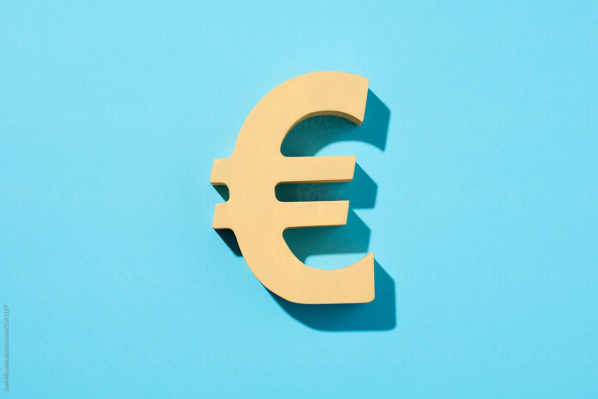 "Yellow Euro Sign" by Stocksy Contributor "Juan Moyano" - Stocksy