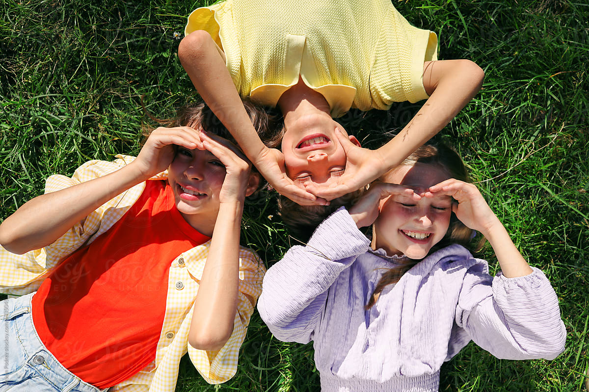 "Children Enjoying Sunshine Outdoors" by Stocksy Contributor "Artem ...