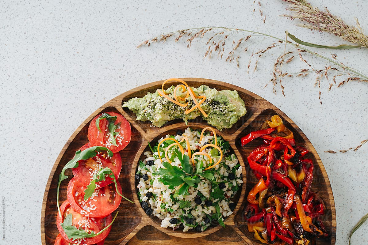 "Food Served On Tapas Wooden Plate" by Stocksy Contributor "Lumina ...