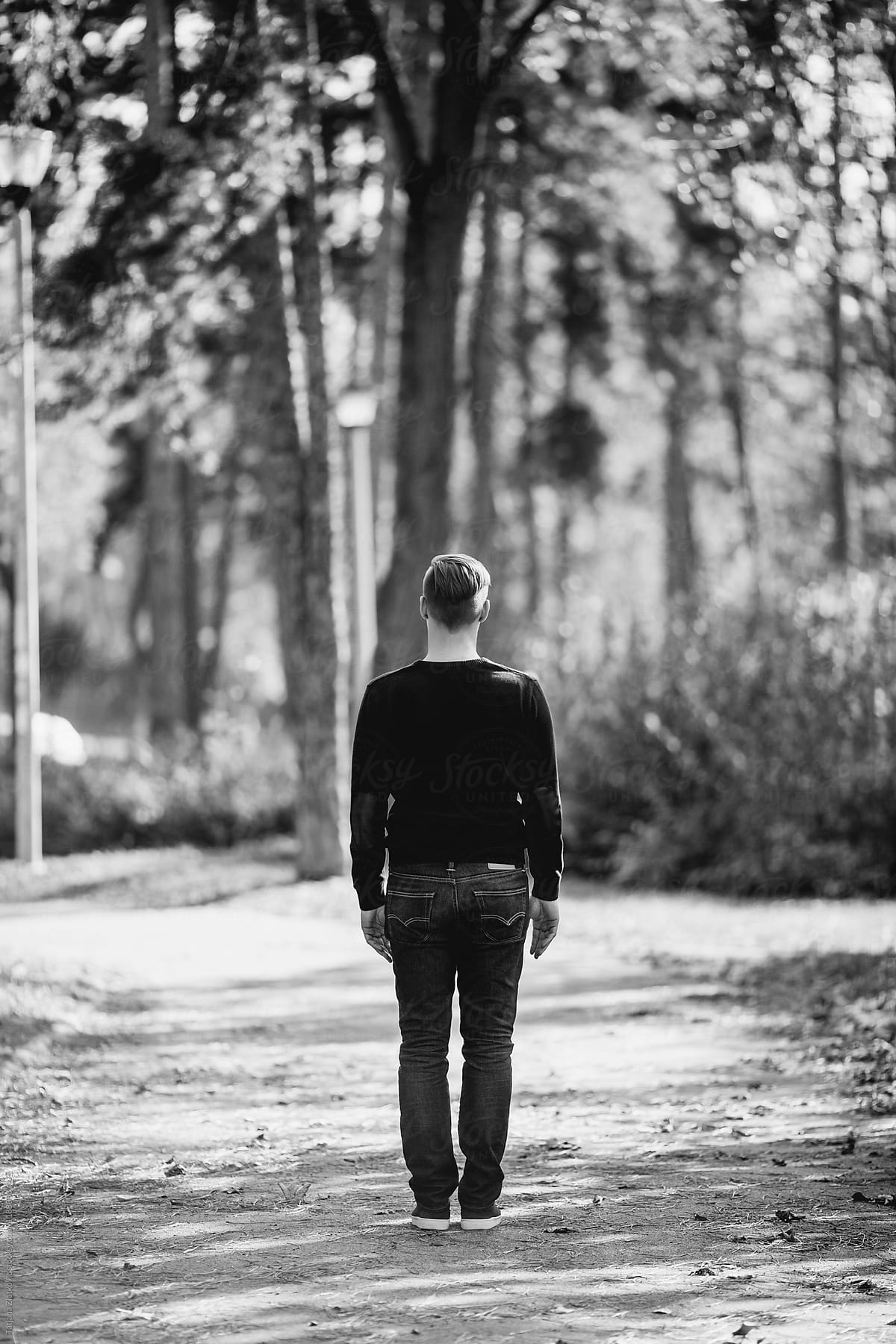 "Man In The Park" by Stocksy Contributor "Tatjana Zlatkovic" - Stocksy