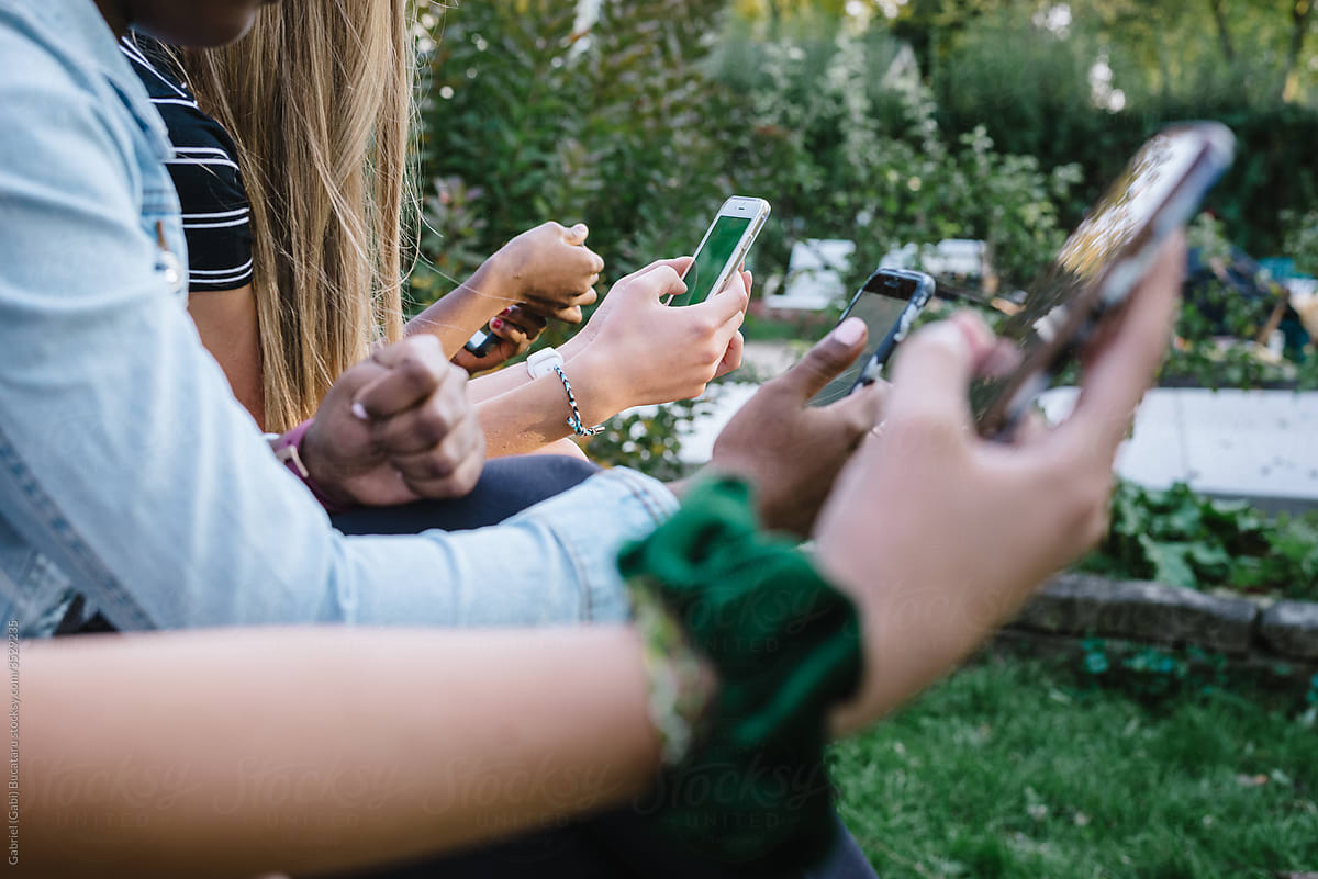"Diverse Teen Girls' Hands With Smartphones" by Stocksy Contributor ...