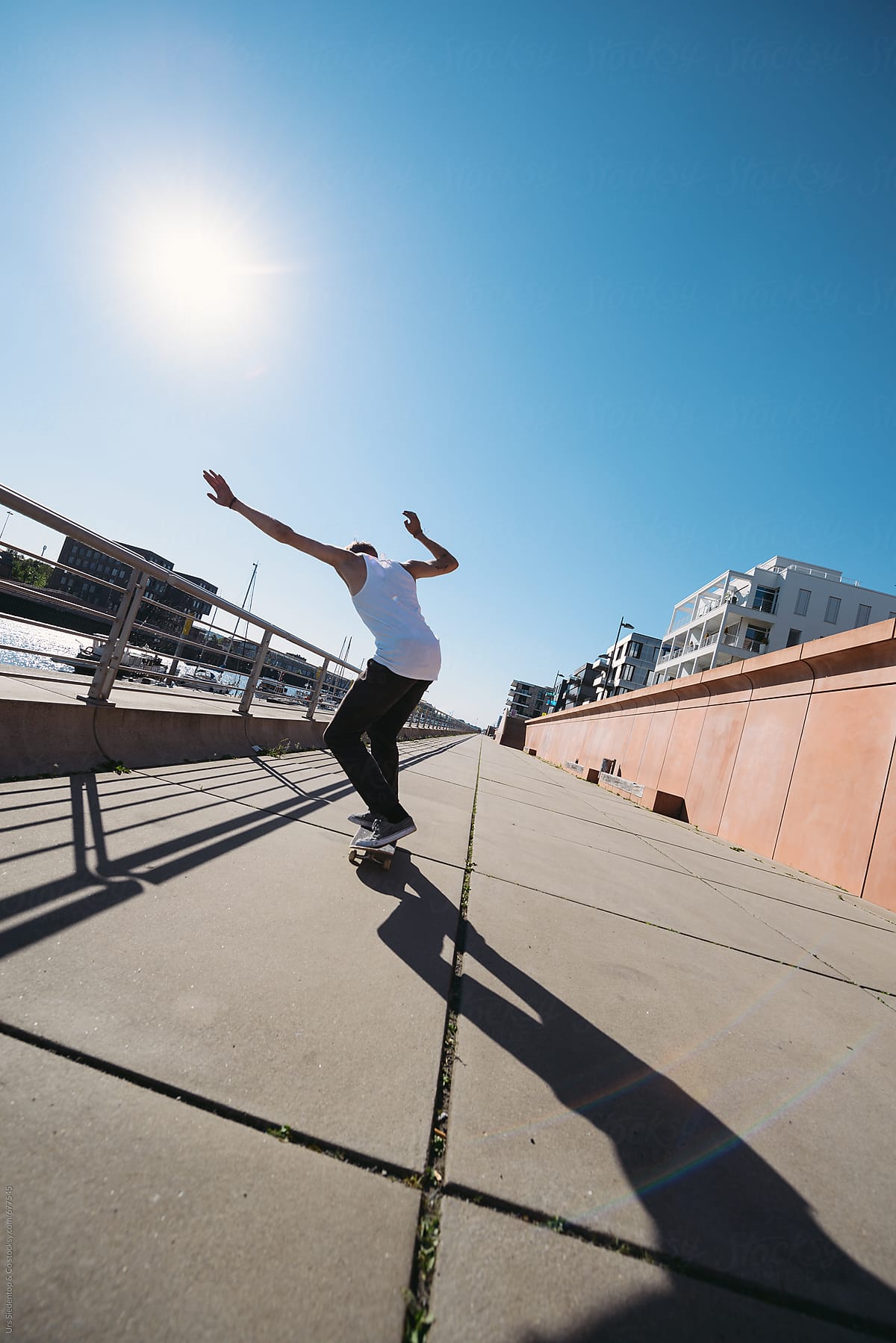 "Skater Against The Sun" by Stocksy Contributor "Urs Siedentop & Co ...