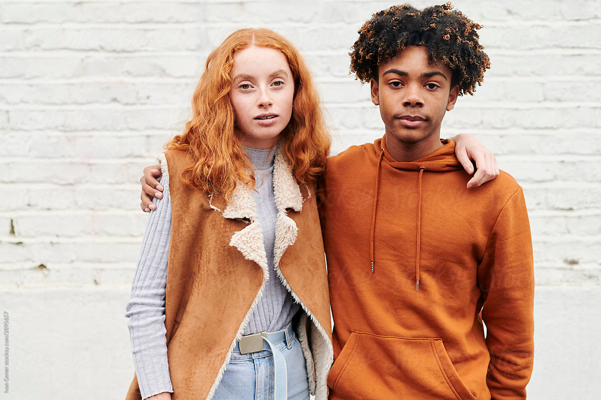 "Two Diverse Teens Standing Outside" by Stocksy Contributor "Ivan Gener ...