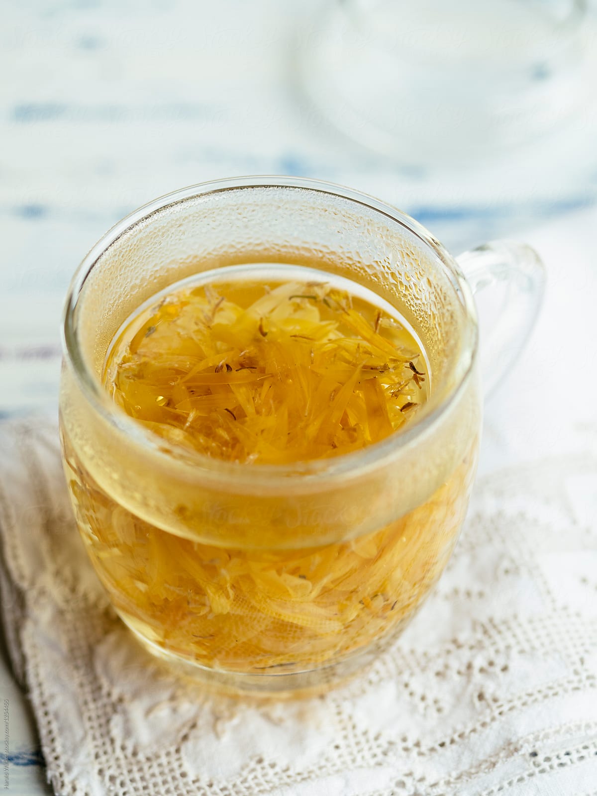 "Calendula Tea" by Stocksy Contributor "Harald Walker" - Stocksy