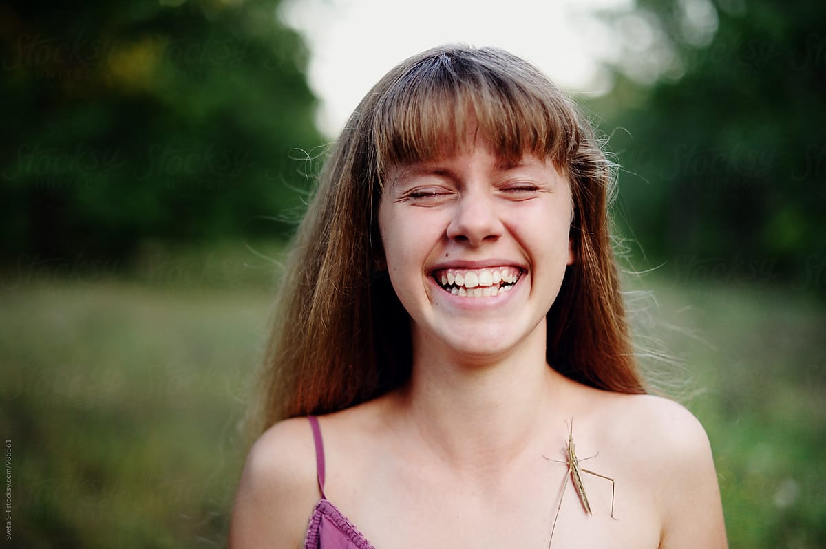 "The Girl And The Grasshopper" by Stocksy Contributor "Sveta SH" - Stocksy