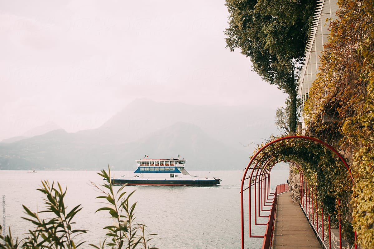 "A Ferry On The Lake" by Stocksy Contributor "Giada Canu" - Stocksy