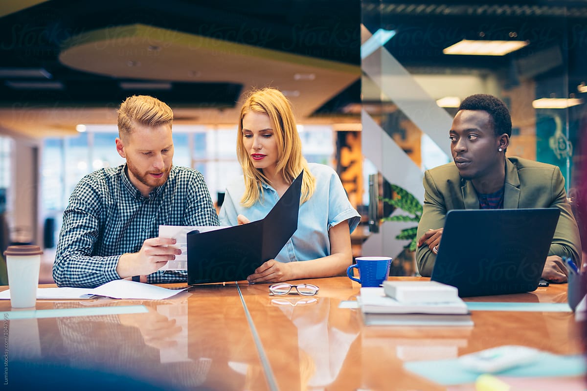 "Business Meeting" by Stocksy Contributor "Lumina" - Stocksy