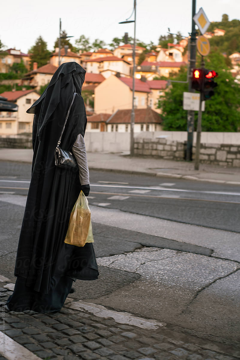 "Muslim Woman Wearing Burqa In The Street Of Sarajevo" by Stocksy ...