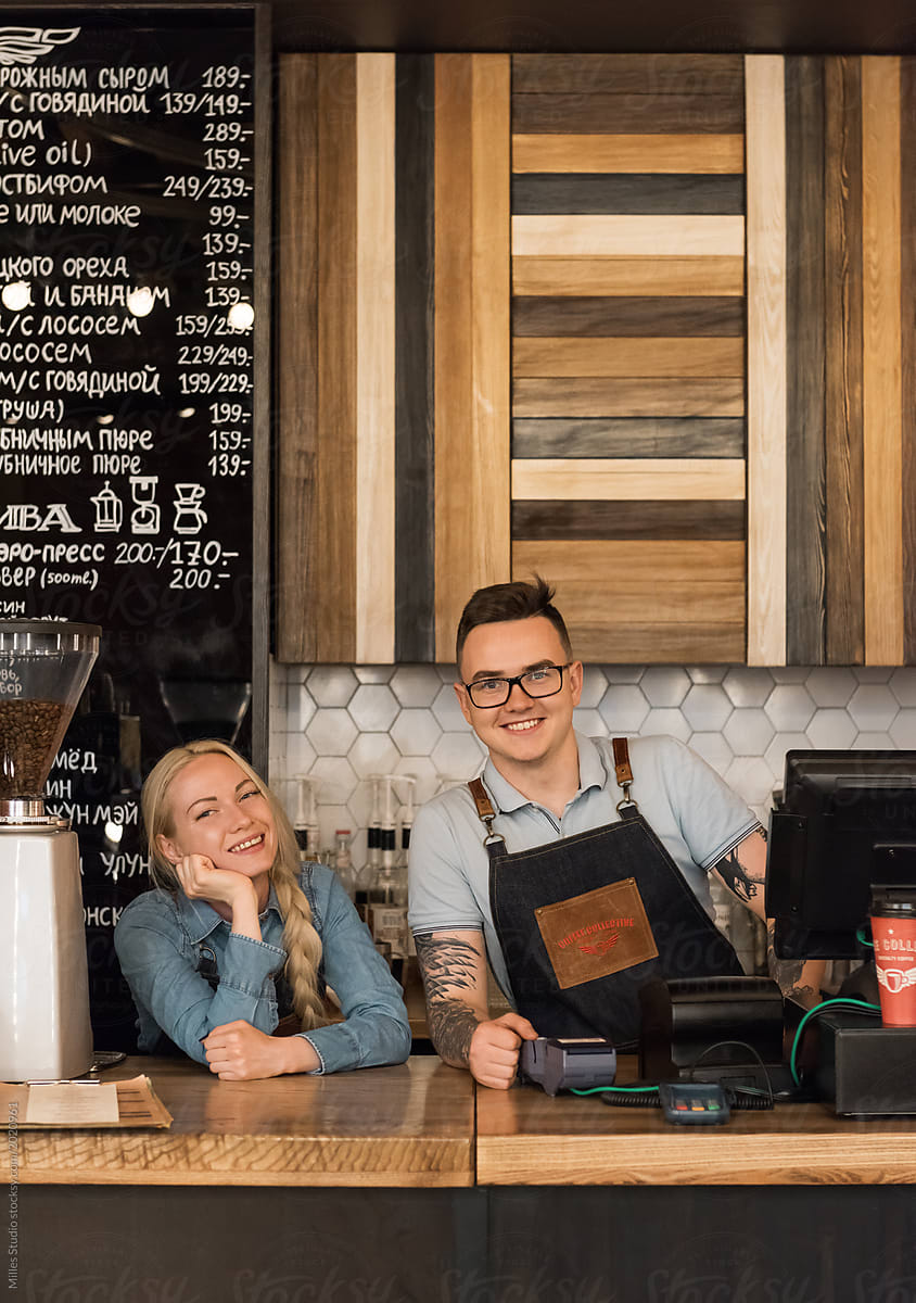 "Smiling Staff Of Modern Cafeteria" by Stocksy Contributor "Milles Team ...
