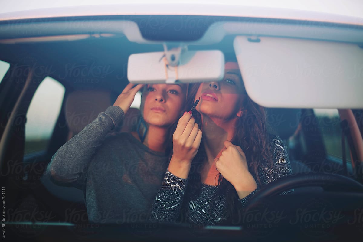 "Two Female Friends Fixing Their Make Up In Car" by Stocksy Contributor ...