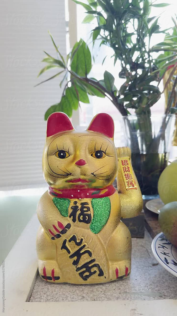 "Chinese Lucky Cat Waving" by Stocksy Contributor "Maryanne Gobble ...