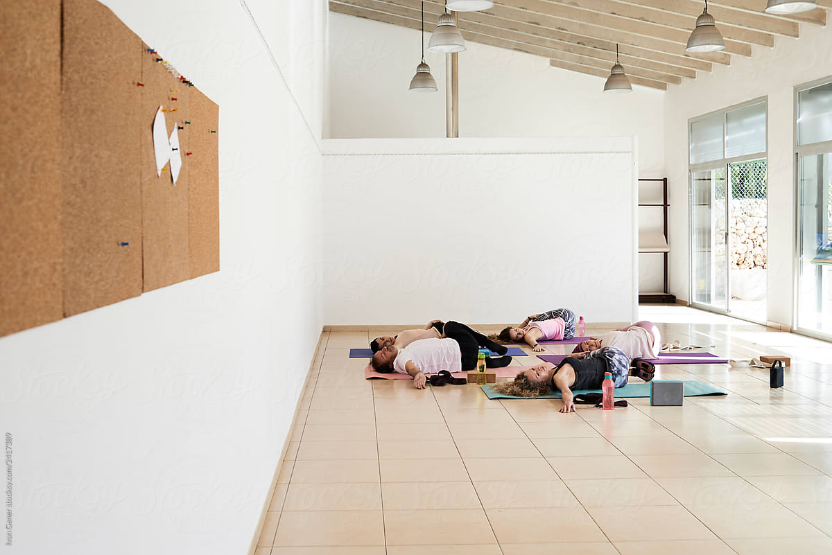 "Group Yoga Class Modern Studio." by Stocksy Contributor "Ivan Gener ...