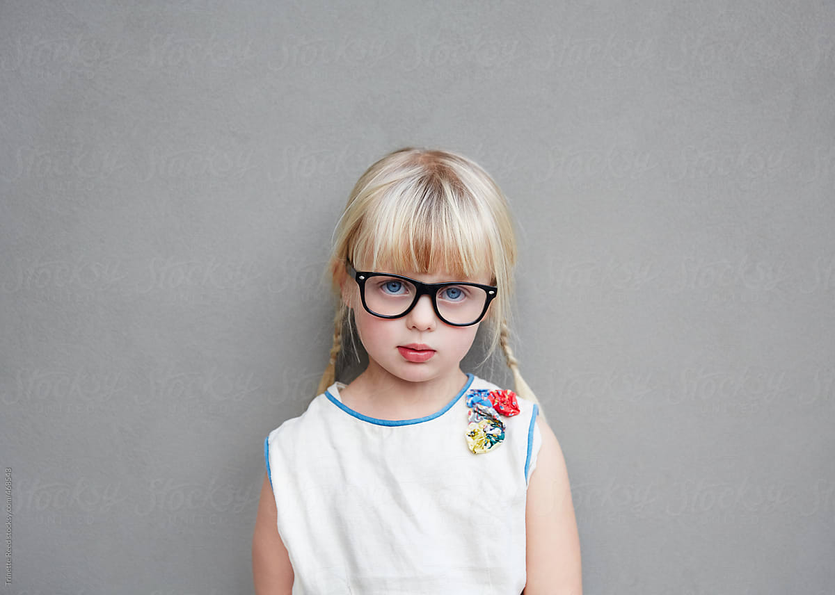 "Portrait Of Adorable Little Girl Wearing Glasses" by Stocksy ...