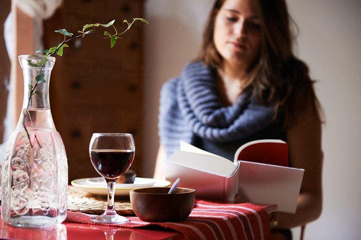 "Woman Reading Book During Lunch" by Stocksy Contributor "Guille ...
