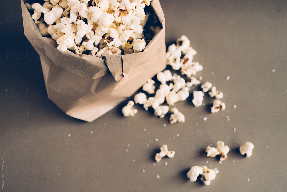 "Pop Corn In A Paper Bag" by Stocksy Contributor "Vera Lair" - Stocksy