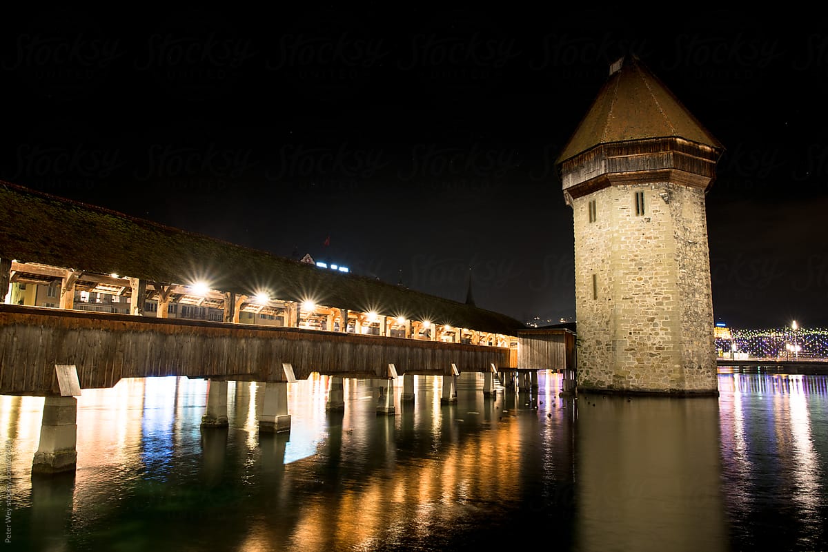 "Chapel Bridge In Luzern At Night" by Stocksy Contributor "Peter Wey ...